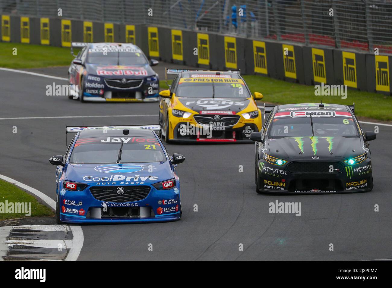 Tim Blanchard of Team CoolDrive drives his Holden Commodore ZB, left ...