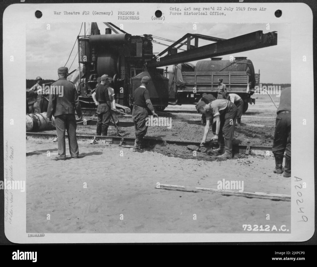 German Prisoners Of War Working On The Taxiway At An Airfield Somewhere ...