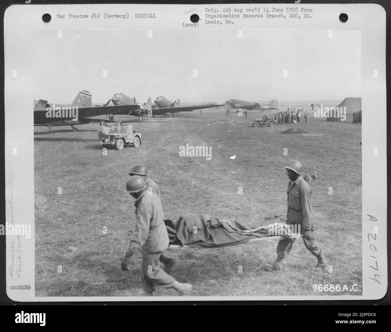 A Wounded Member Of 834Th Engineer Aviation Battalion Is Carried By ...