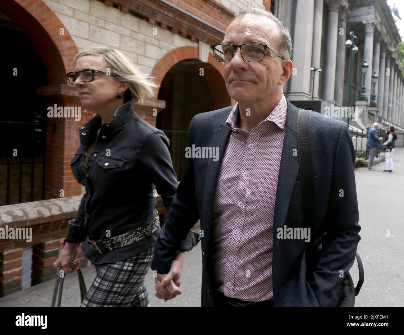 Freed murder suspect Henry Keogh (right) leaves Parliament House with ...