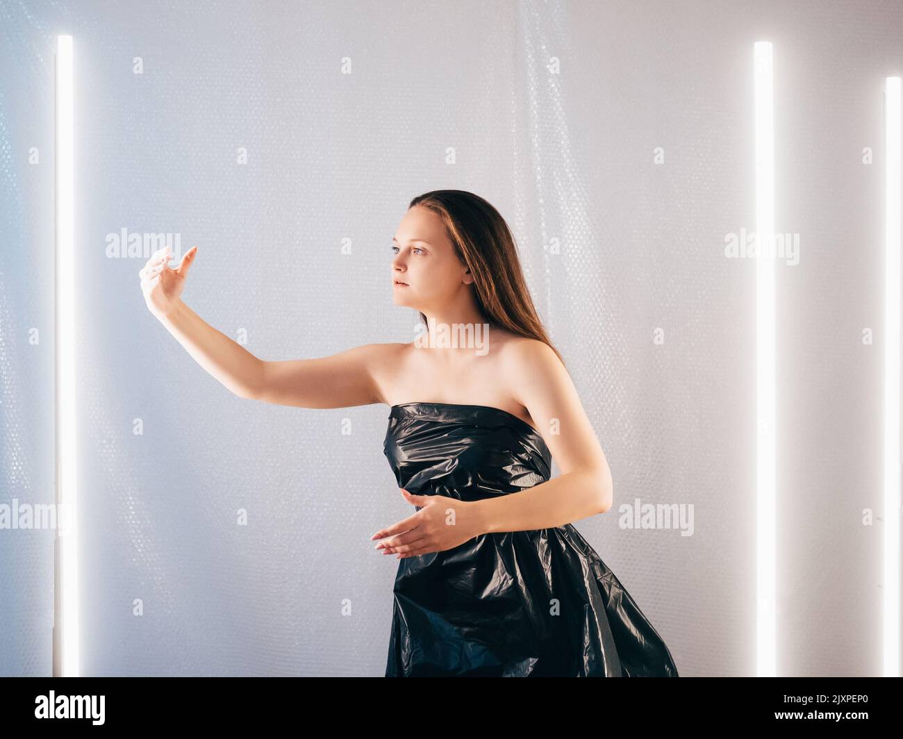 zero waste plastic fashion woman garbage bag dress Stock Photo - Alamy