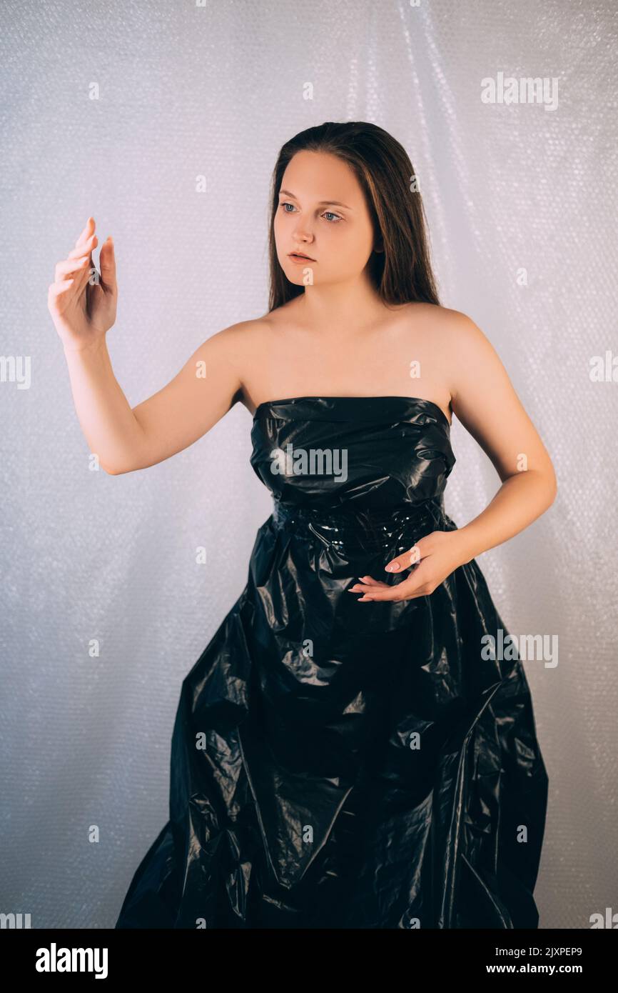 waste recycling plastic fashion female model dress Stock Photo - Alamy