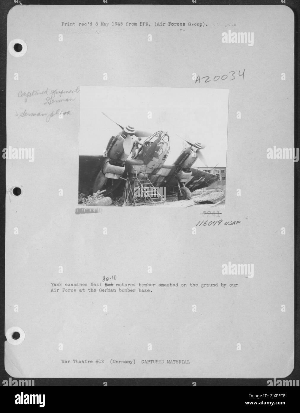 Yank Examines Nazi He-111 Motored Bomber Smashed On The Ground By Our ...