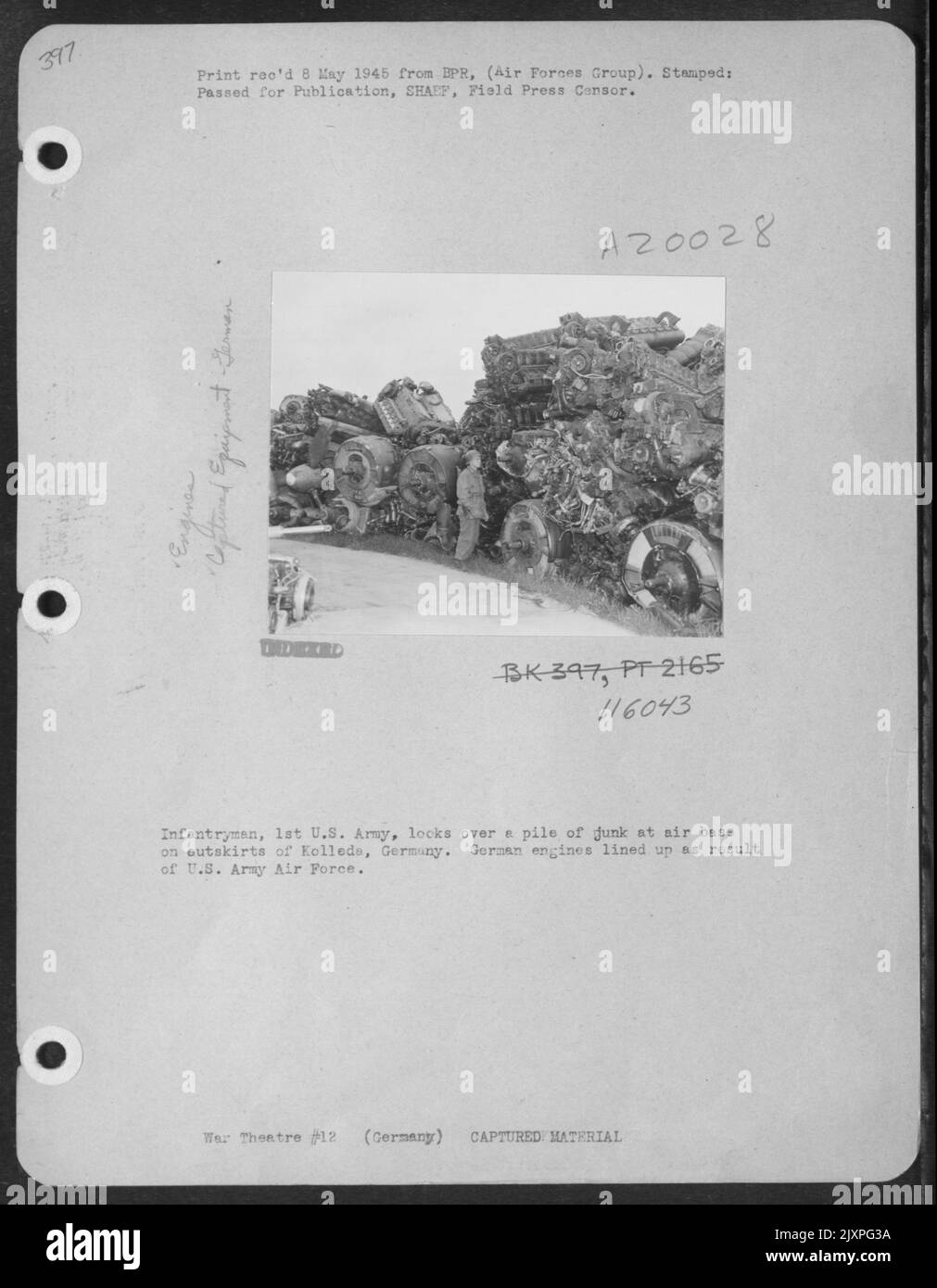 Infantryman, 1St U.S. Army, Looks Over A Pile Of Junk At An Air Base On ...