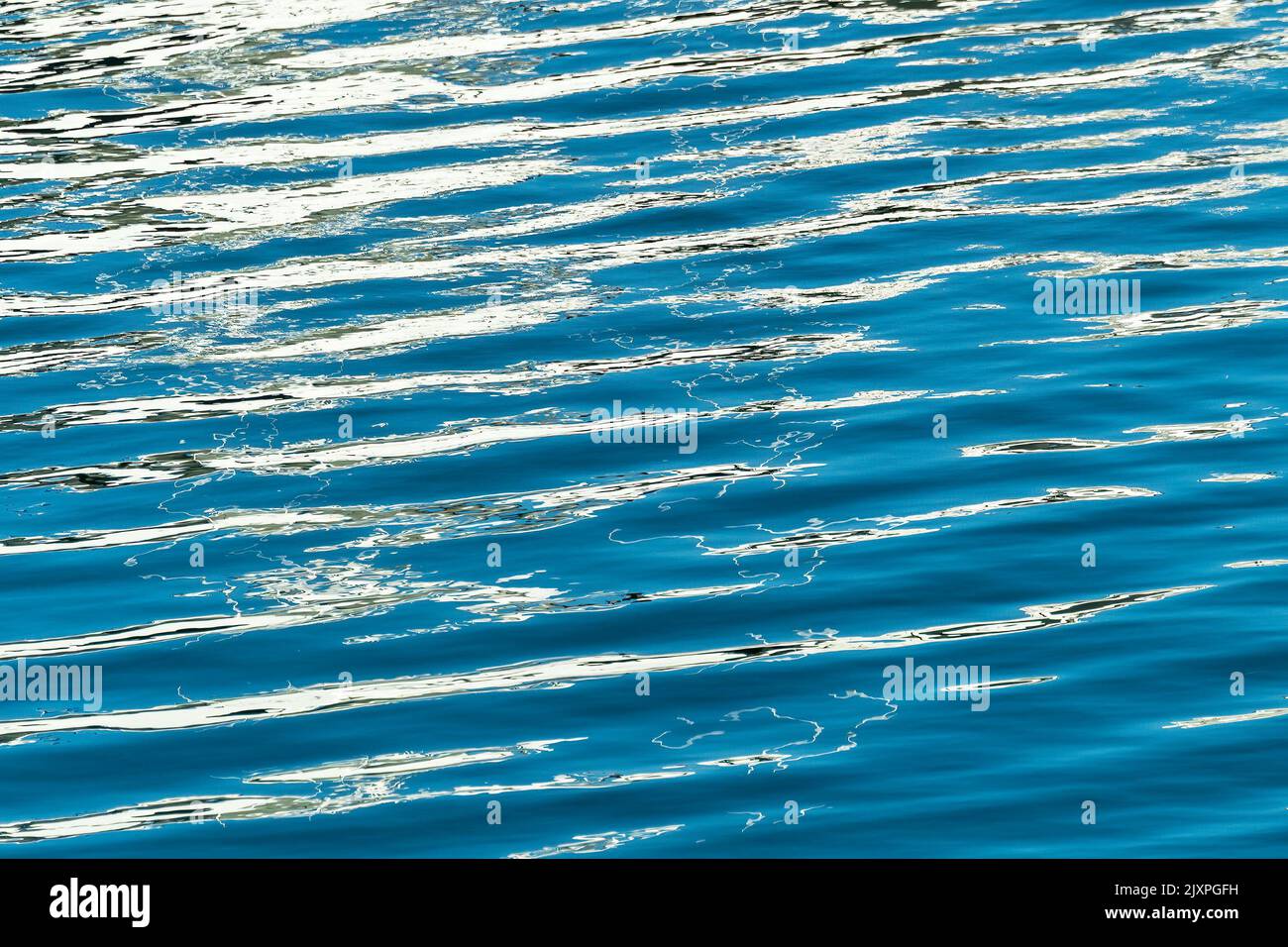 Reflections on ocean surface near Shelter Island mooring Stock Photo ...