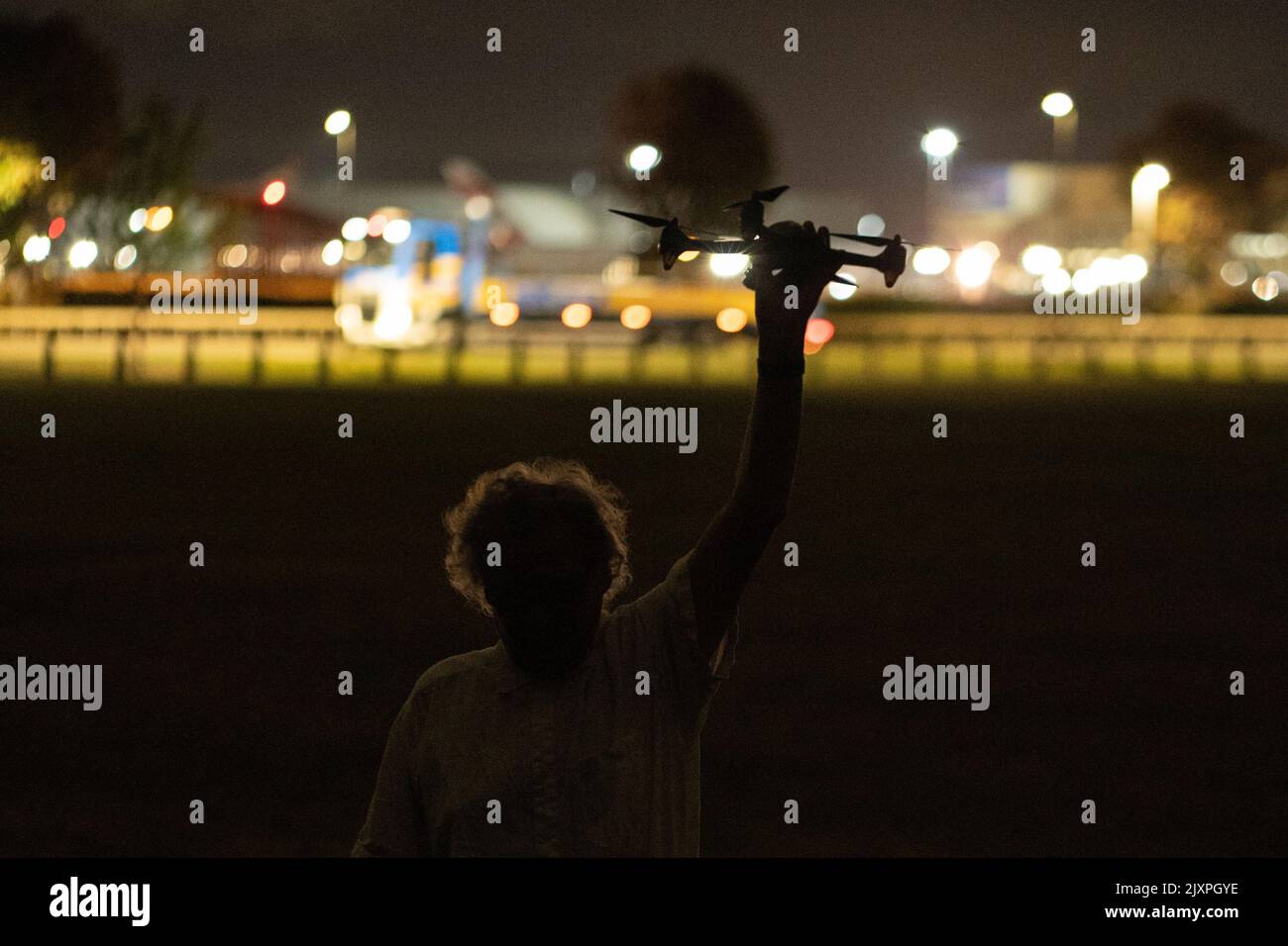 A Protester is seen preparing to fly a drone next to Heathrow Airport ...