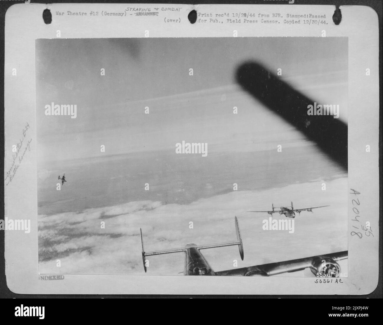 15th AF Consolidated B-24 plunges out of formation after hit by ...