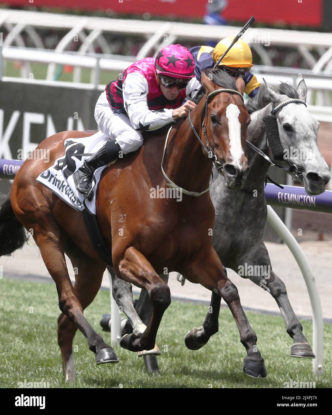 Jockey Corey Brown rides Nessuna Fiducia (left) to victory in Race 2 ...
