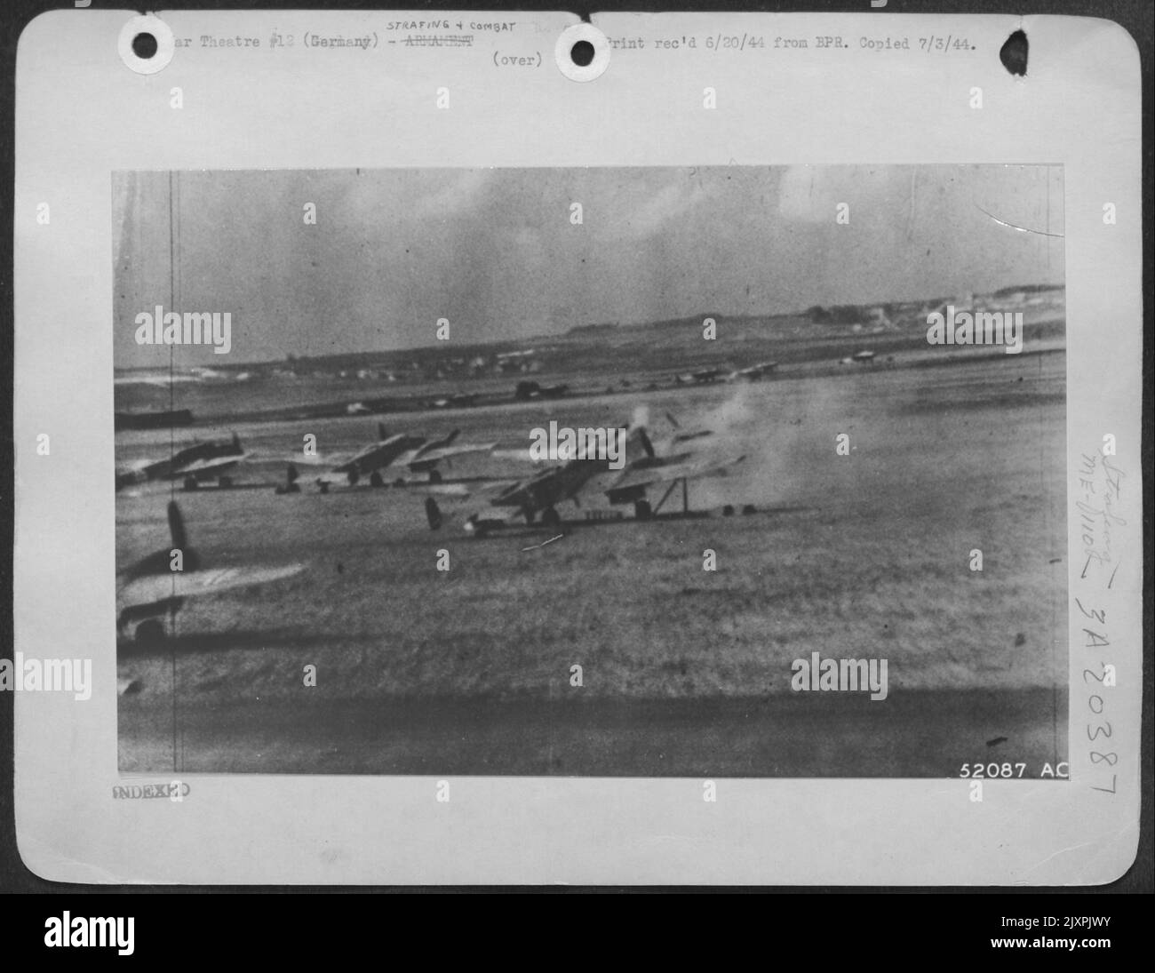 Me-110s are raked by North American P-51s of the 355th Fighter Group ...