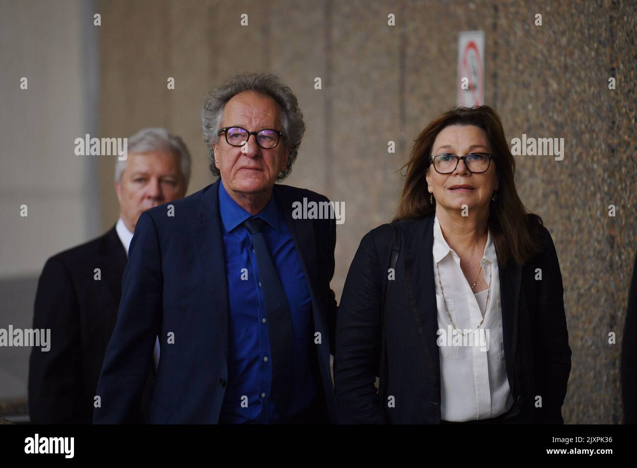 Australian actor Geoffrey Rush (centre) arrives with his wife Jane ...