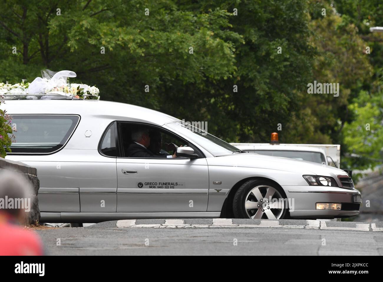 A hearse is seen after the funeral service for Justin Gatto outside the ...