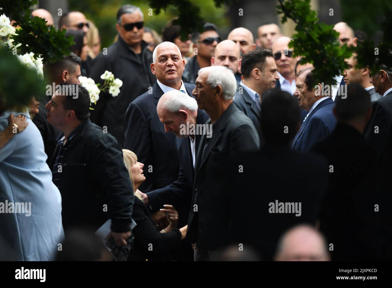 Cheryle Gatto (bottom left) and Mick Gatto (centre) are seen after the ...