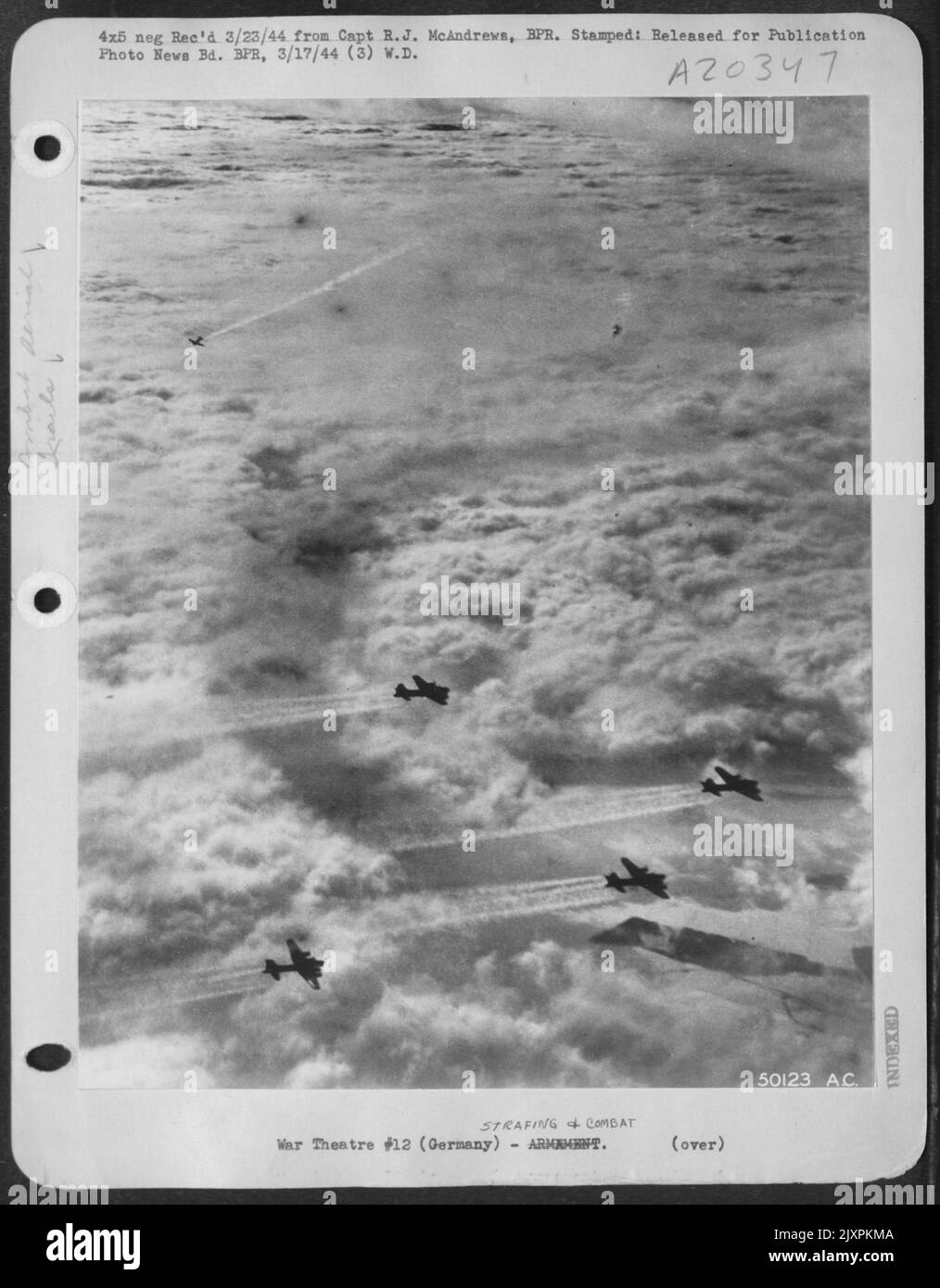 ENEMY ATTACK-Diving to attack, a German FW 190 fighter (upper left ...