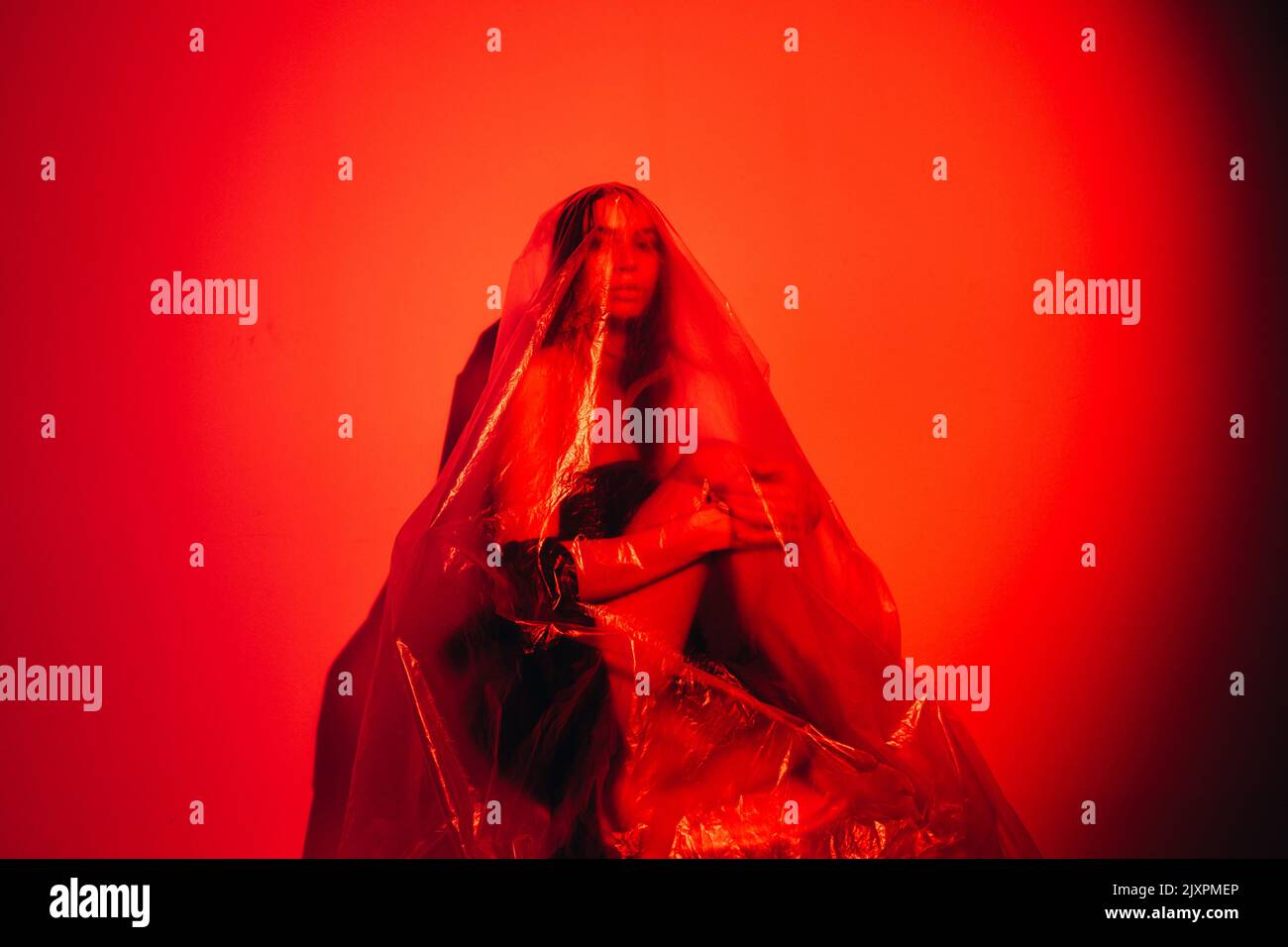 red art portrait pandemic self isolation woman Stock Photo - Alamy