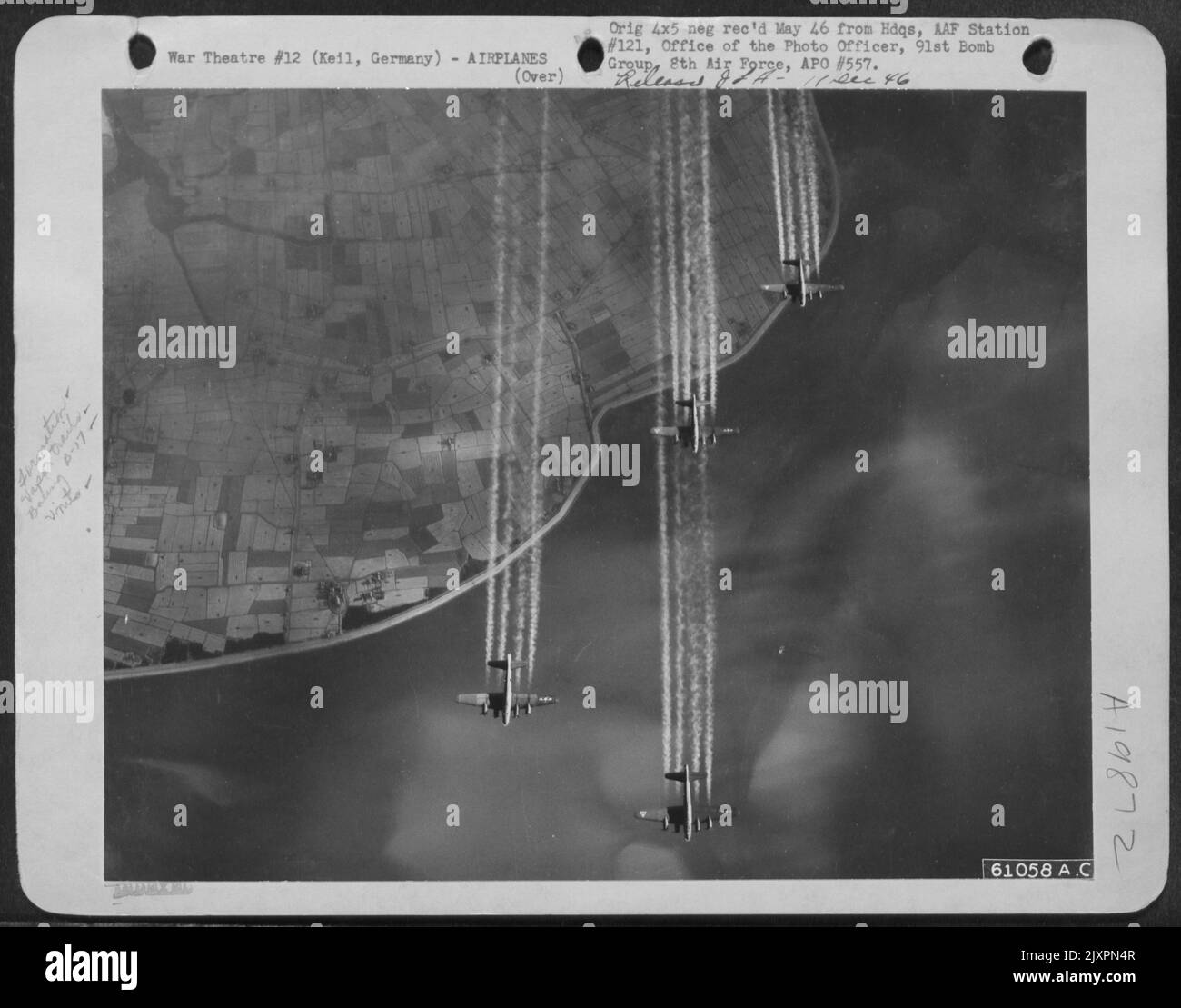 Vapor Trails Stream Behind A Formation Of Boeing B-17 Flying Fortresses ...