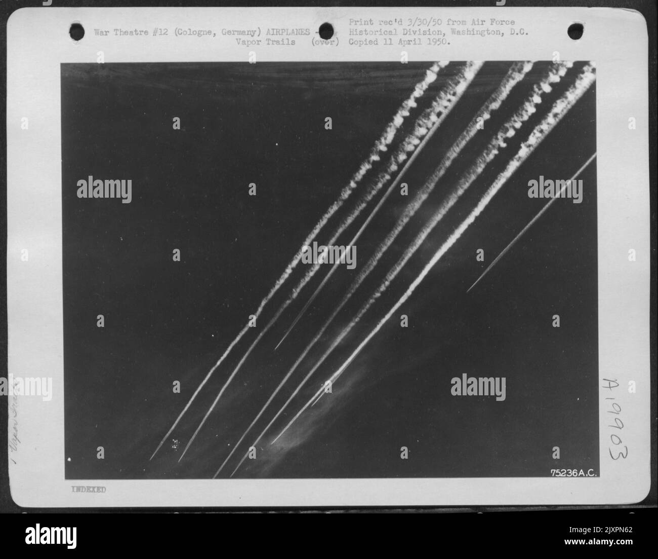 Planes Leave A Long Path Of Vapor Trails In The Sky While On A Bombing ...