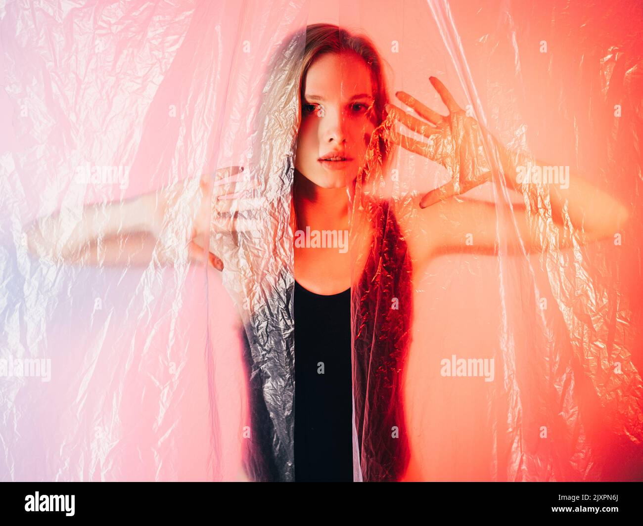 pandemic self isolation disturbed woman neon light Stock Photo - Alamy