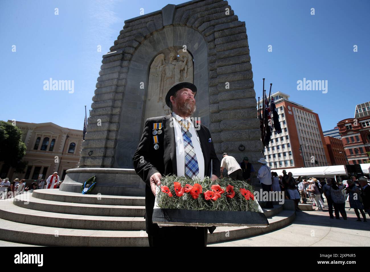 David-John MacKellar, laying poppies from that represents the nine ...