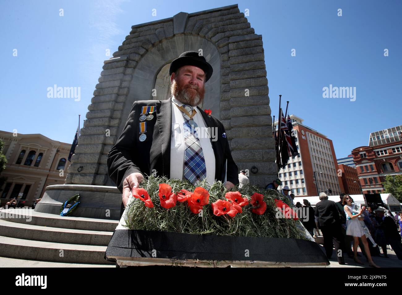 David-John MacKellar, laying poppies from that represents the nine ...