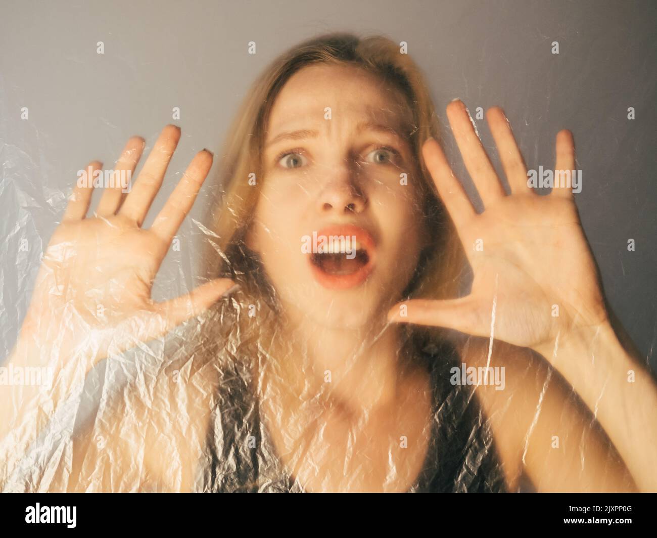 covid-19 self isolation defocused portrait woman Stock Photo - Alamy