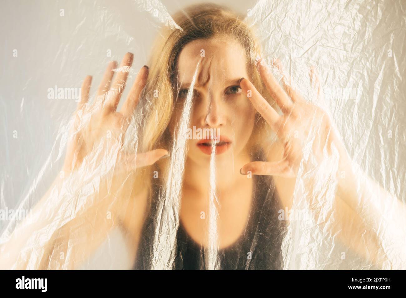 pandemic self isolation defocused portrait woman Stock Photo - Alamy
