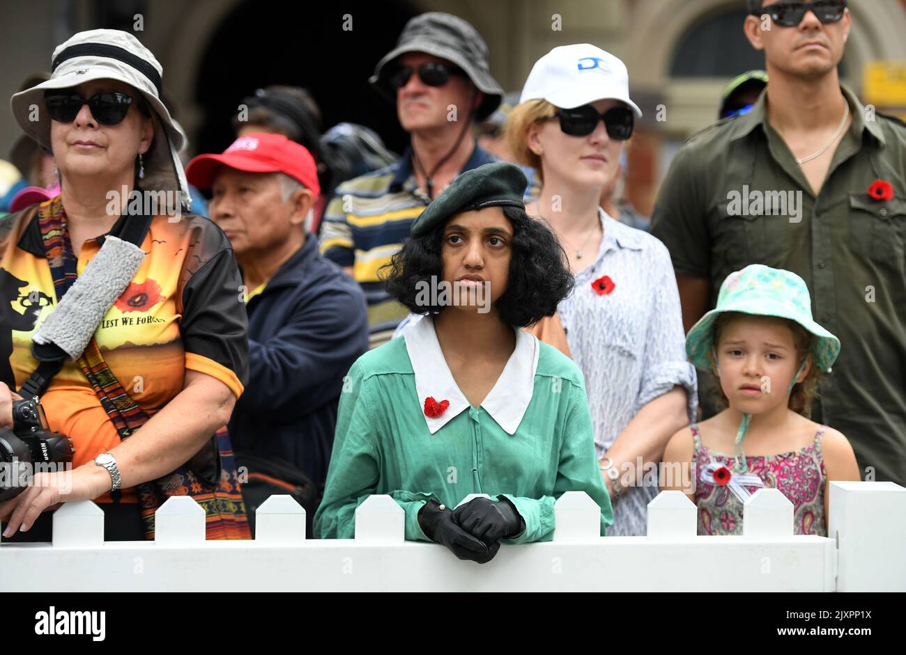 Mary De Zilva (centre), dressed in WWI-era fashion, becomes emotional ...