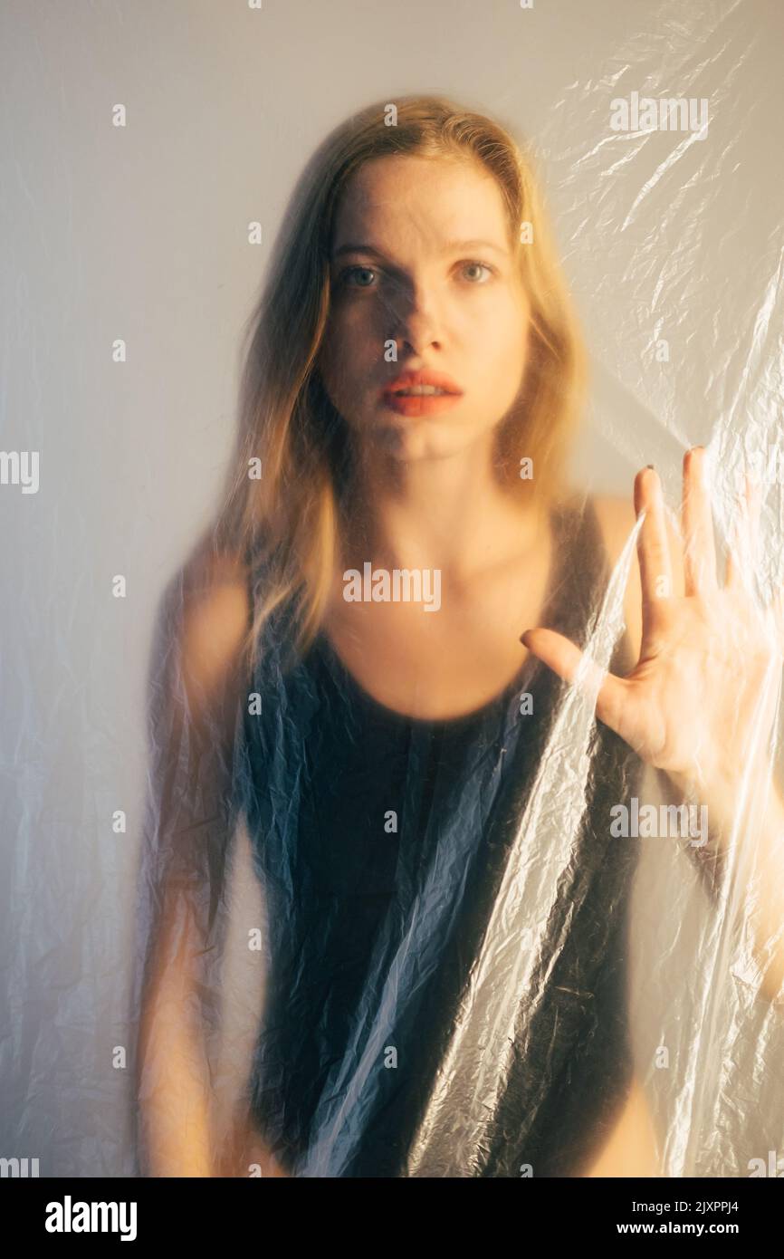 pandemic self isolation defocused portrait woman Stock Photo - Alamy