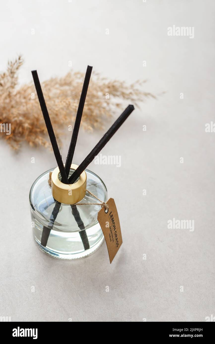 Fragrance diffuser for home on light concrete background close up Stock ...