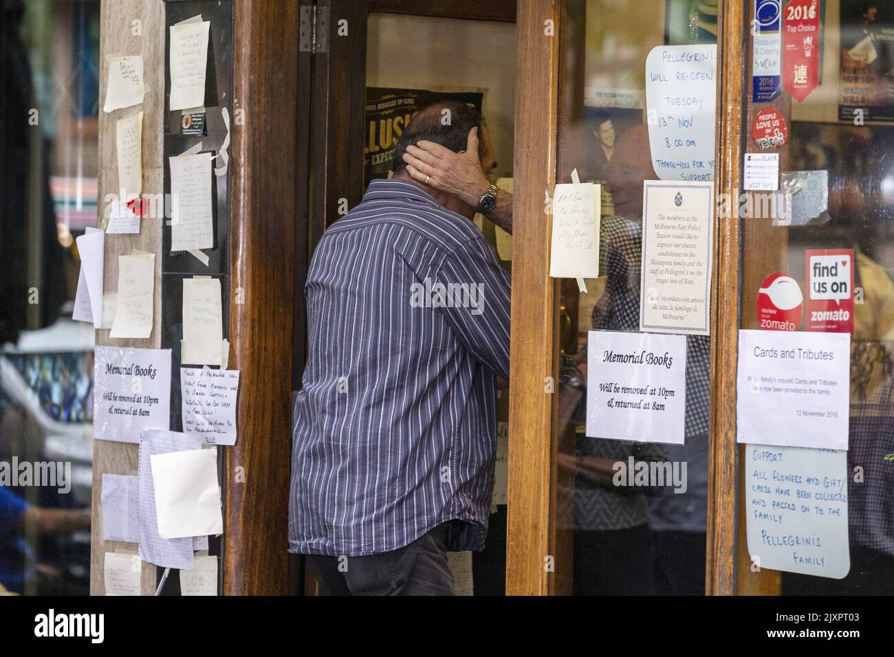 Joe Cecchini is welcomed inside Pellegrini's Expresso Bar as it reopens ...