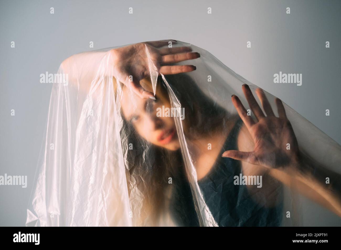 woman protection defocused art portrait isolation Stock Photo - Alamy