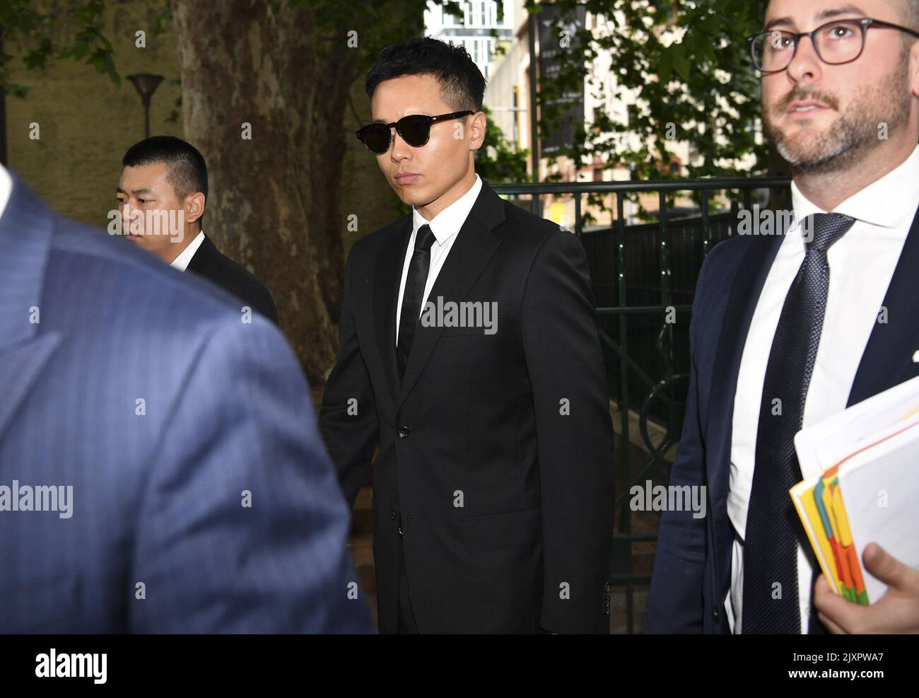 Chinese actor Yunxiang Gao (centre) arrives at Sydney Central Local ...