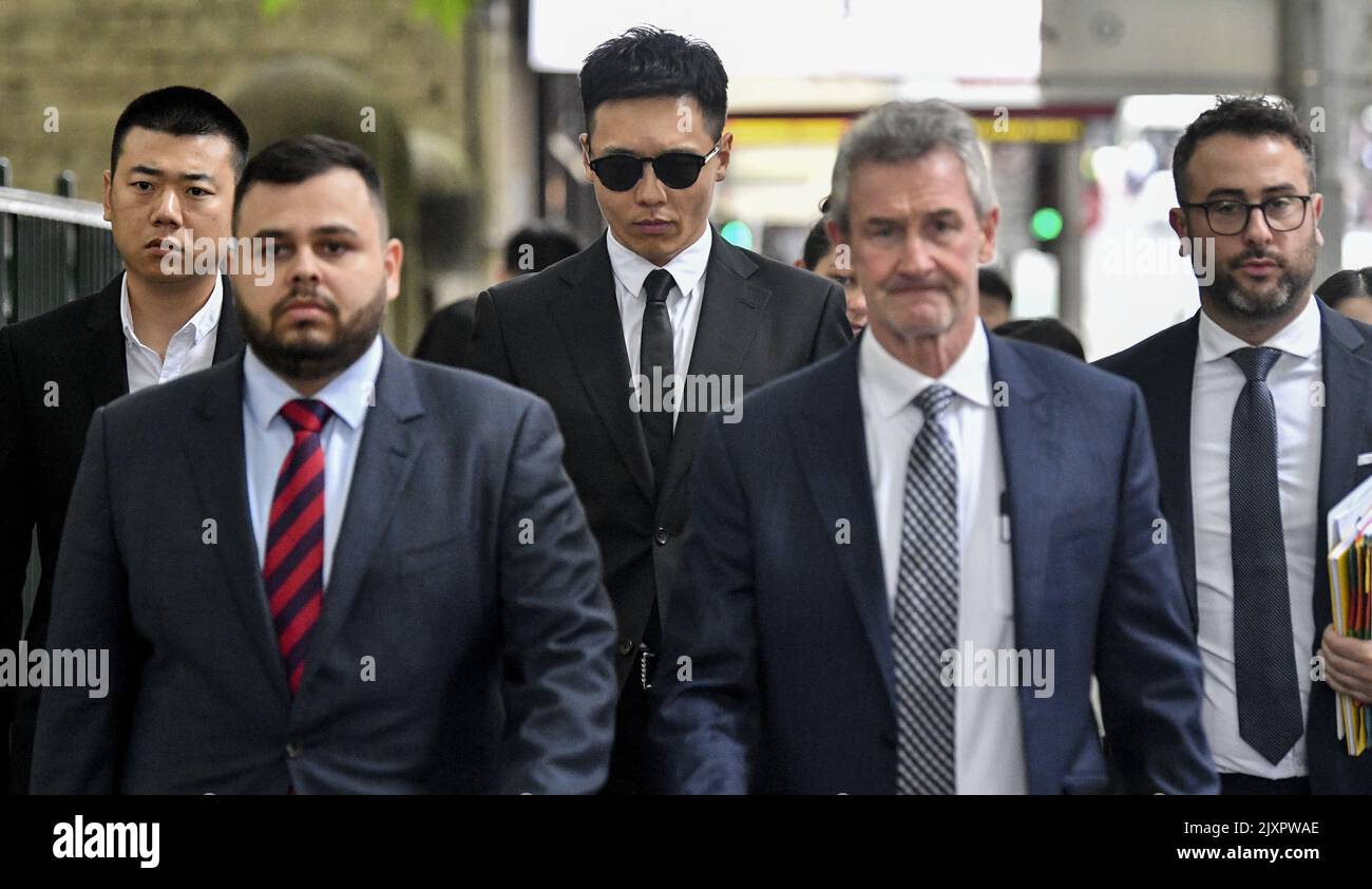 Chinese actor Yunxiang Gao (centre) arrives at Sydney Central Local ...