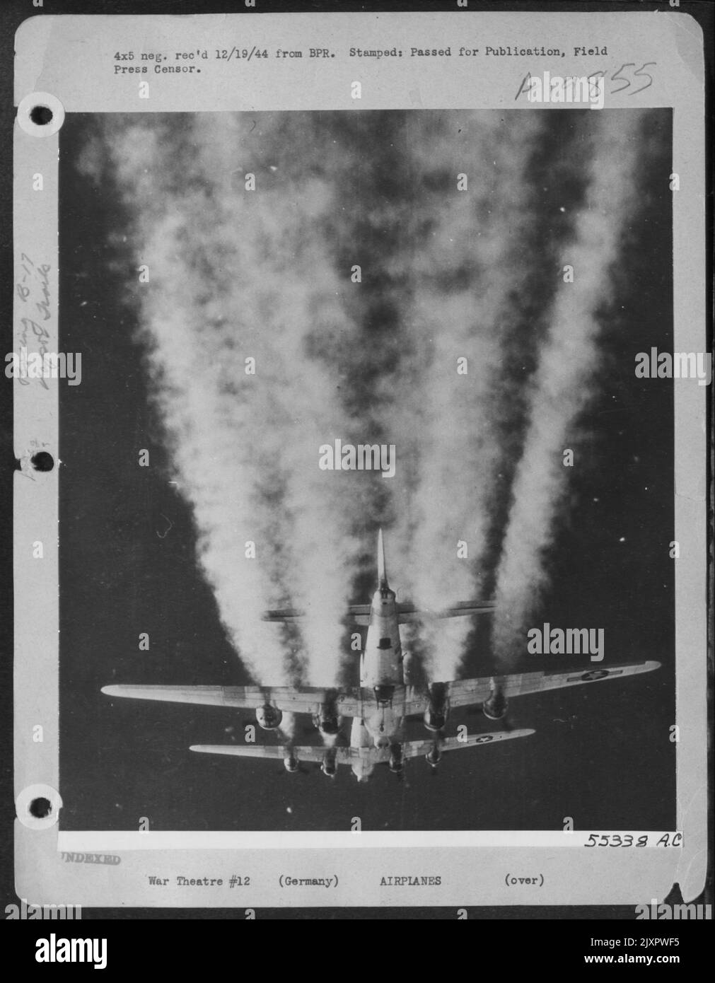 Contrails stream out behind two U.S. 8th AF Boeing B-17 Flying ...
