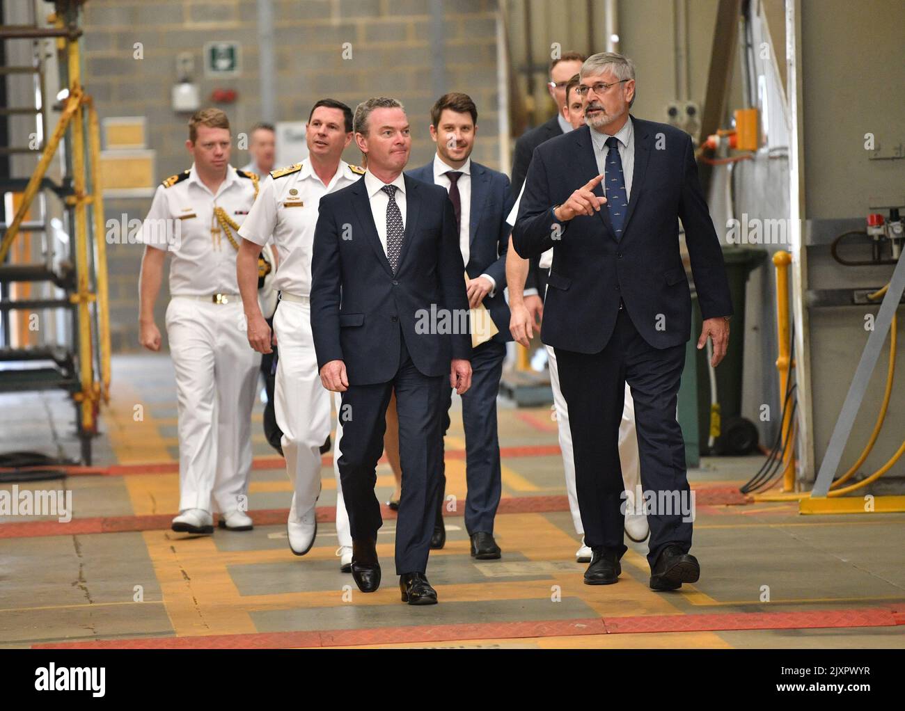 Minister for Defence Industry Christopher Pyne is seen with Peter ...