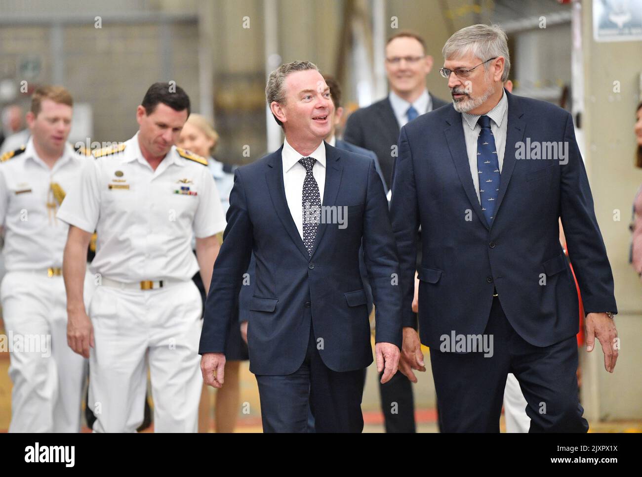 Minister for Defence Industry Christopher Pyne is seen with Peter ...