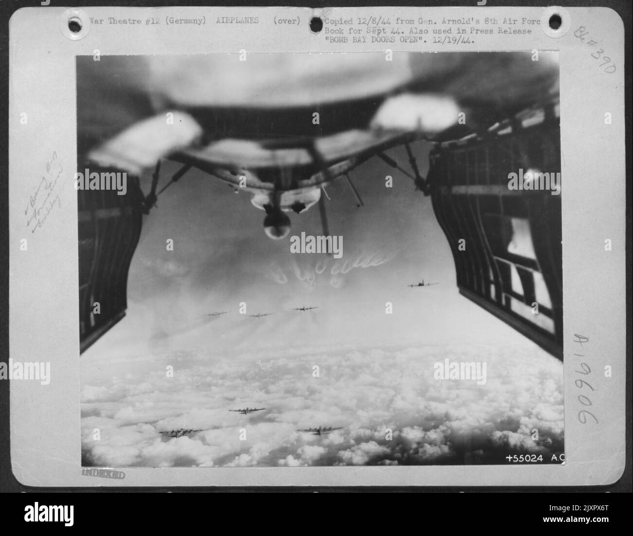 BOMB BAY DOORS OPEN-The open bomb bay doors of a Flying Fortress frame ...