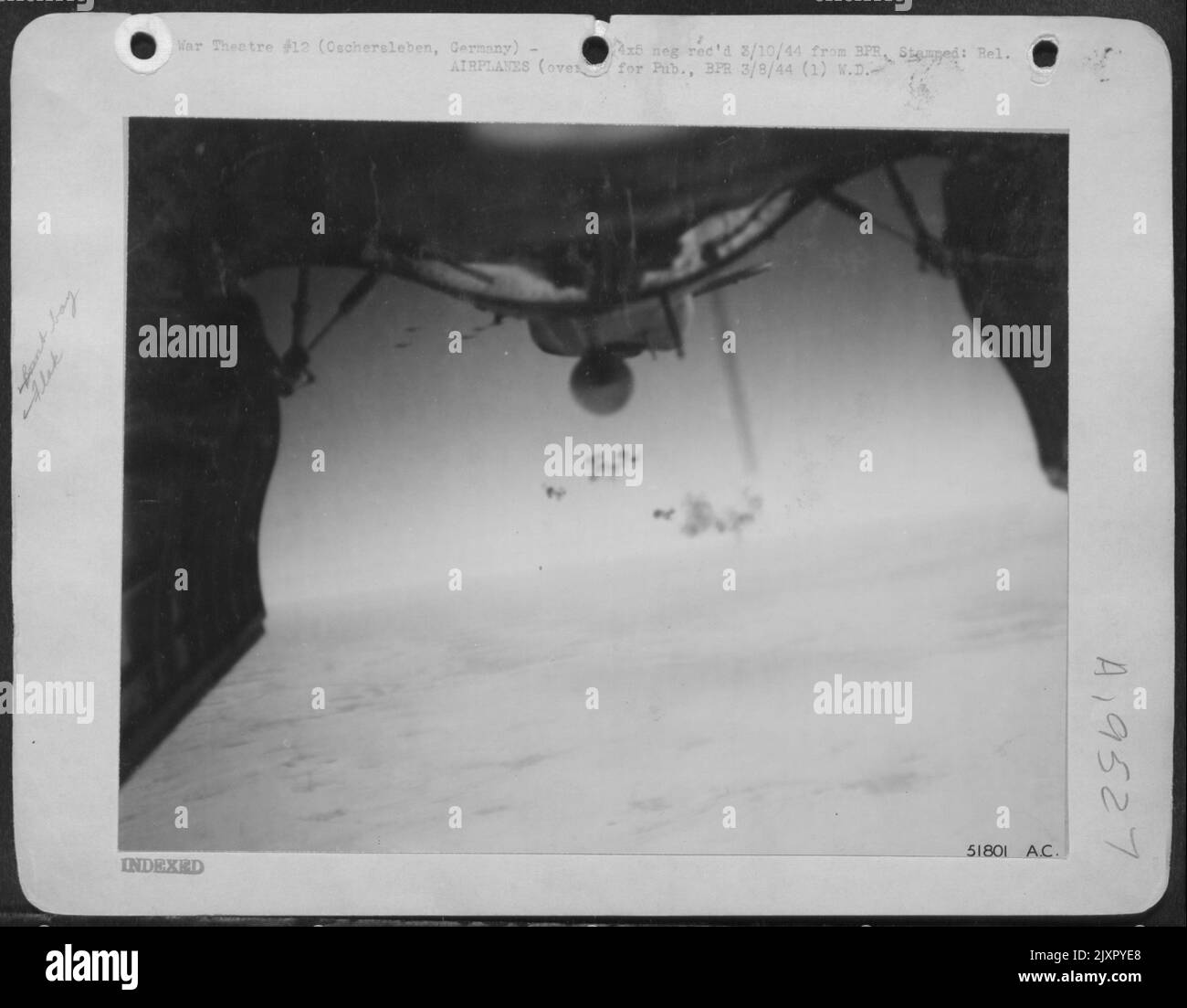 FLAK AHEAD--"Framed" by the open bomb bay doors of a Boeing B-17, flak ...