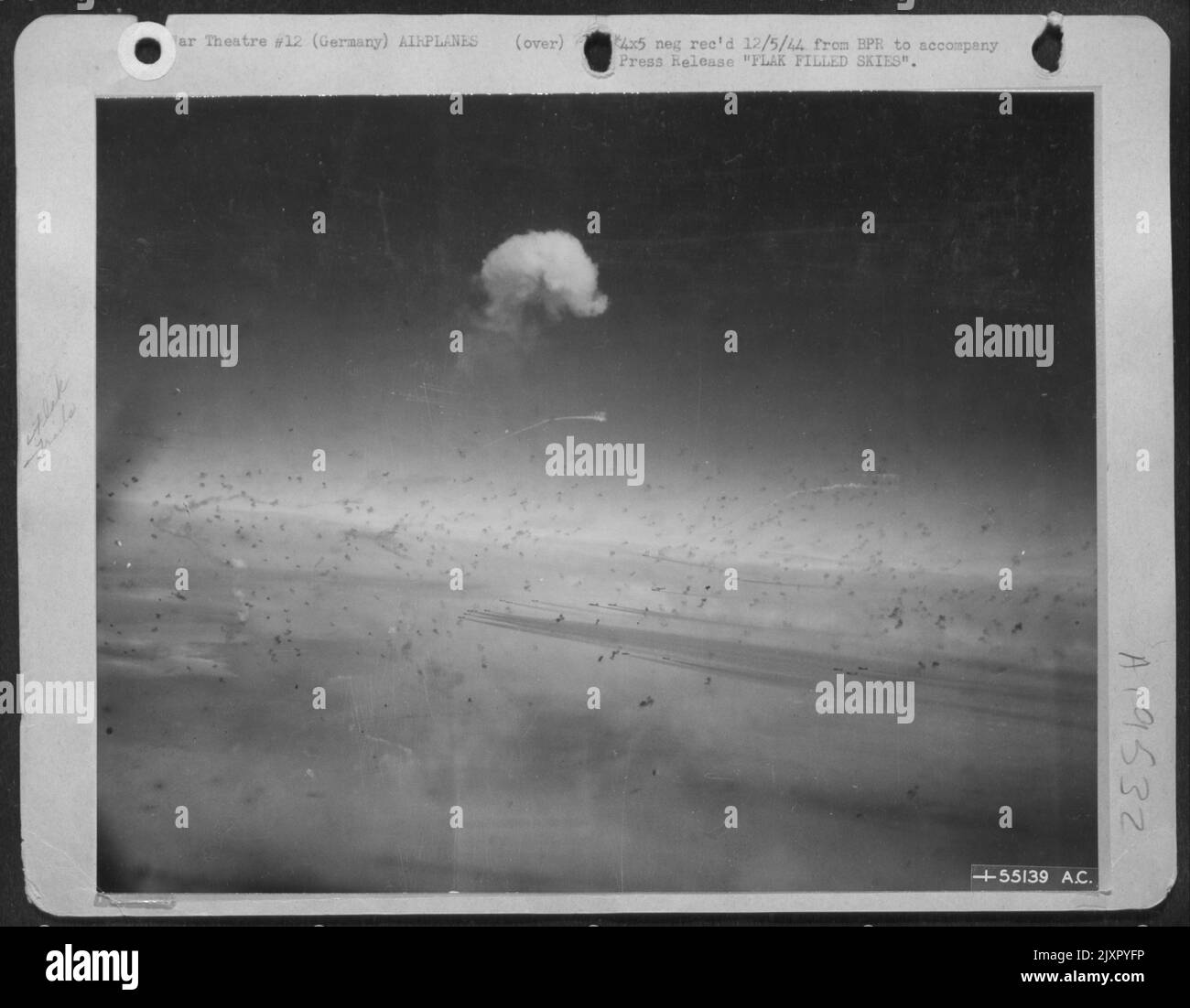 FLAK FILLED SKIES-The white cloud is all that remains of a Flying ...