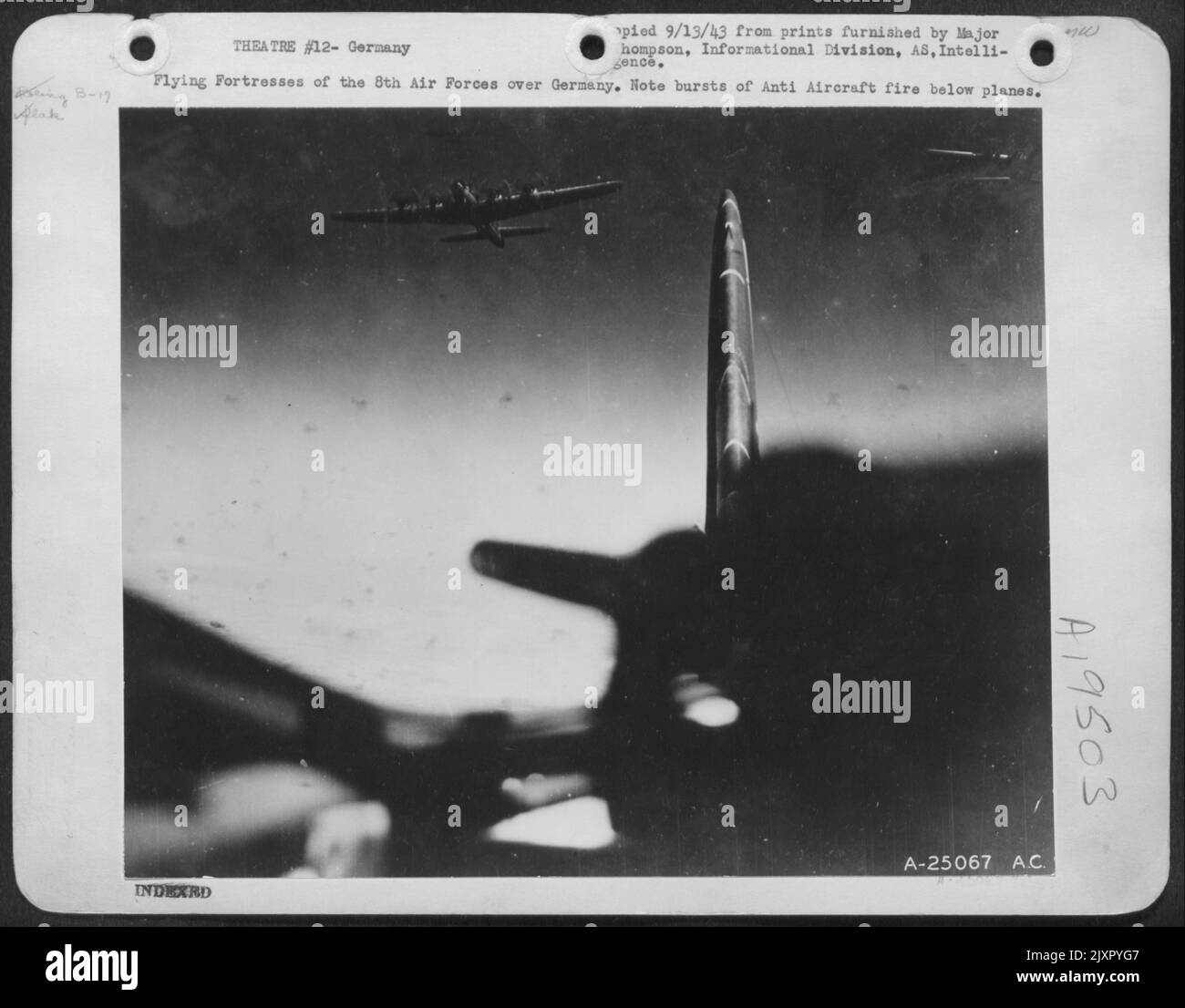 Flying Fortresses of the 8th Air Forces over Germany. Note bursts of ...
