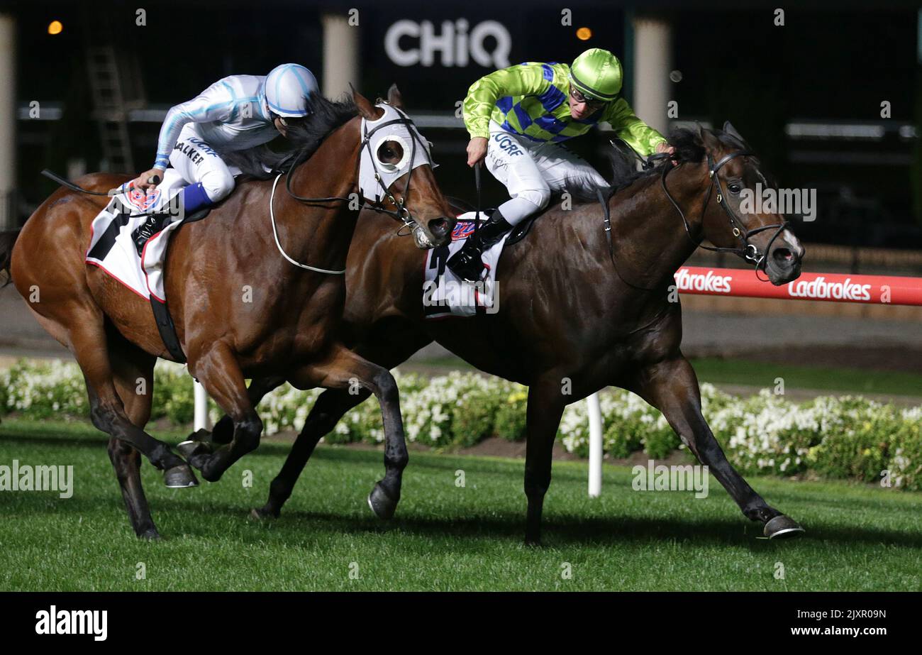 Jockey Jack Martin (on the rail) rides Our Luca to victory in race 8 ...