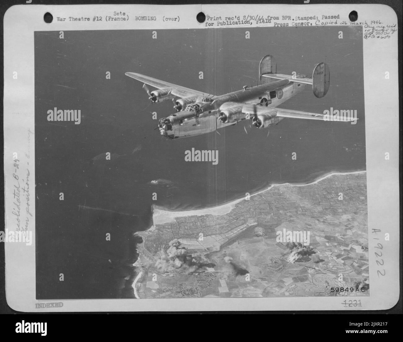 A Consolidated B-24 Liberator Of The 15Th Aaf Flies Over Smoke From ...