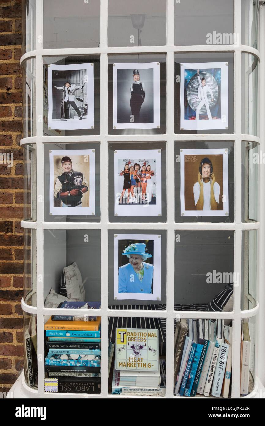 Shop window displaying humorous images of the Queen in celebration of ...