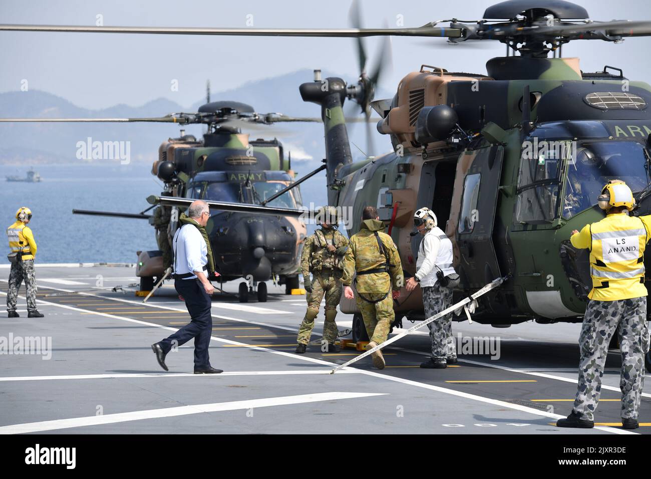 Prime Minister Scott Morrison prepares to leave the Canberra class HMAS ...