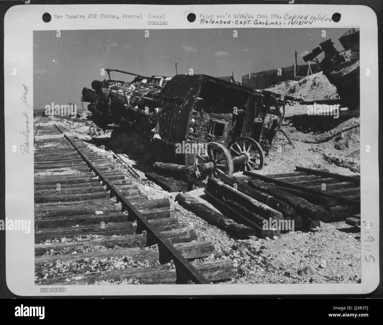 Lying in a hole, caused when a bomb from an 8th Air Force heavy bomber ...