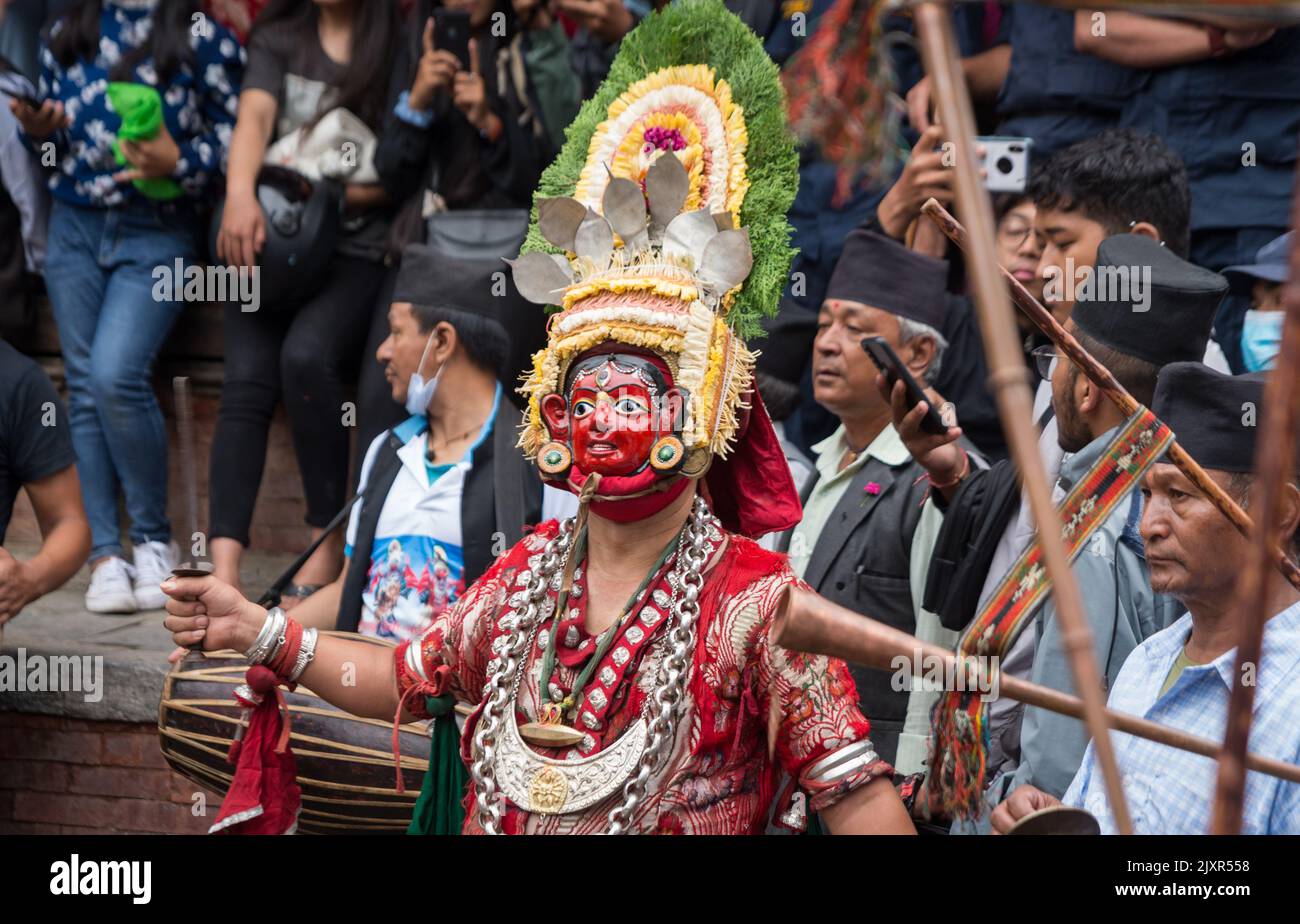 Traditional Nepali masked dancer performs the ritual dance during the ...