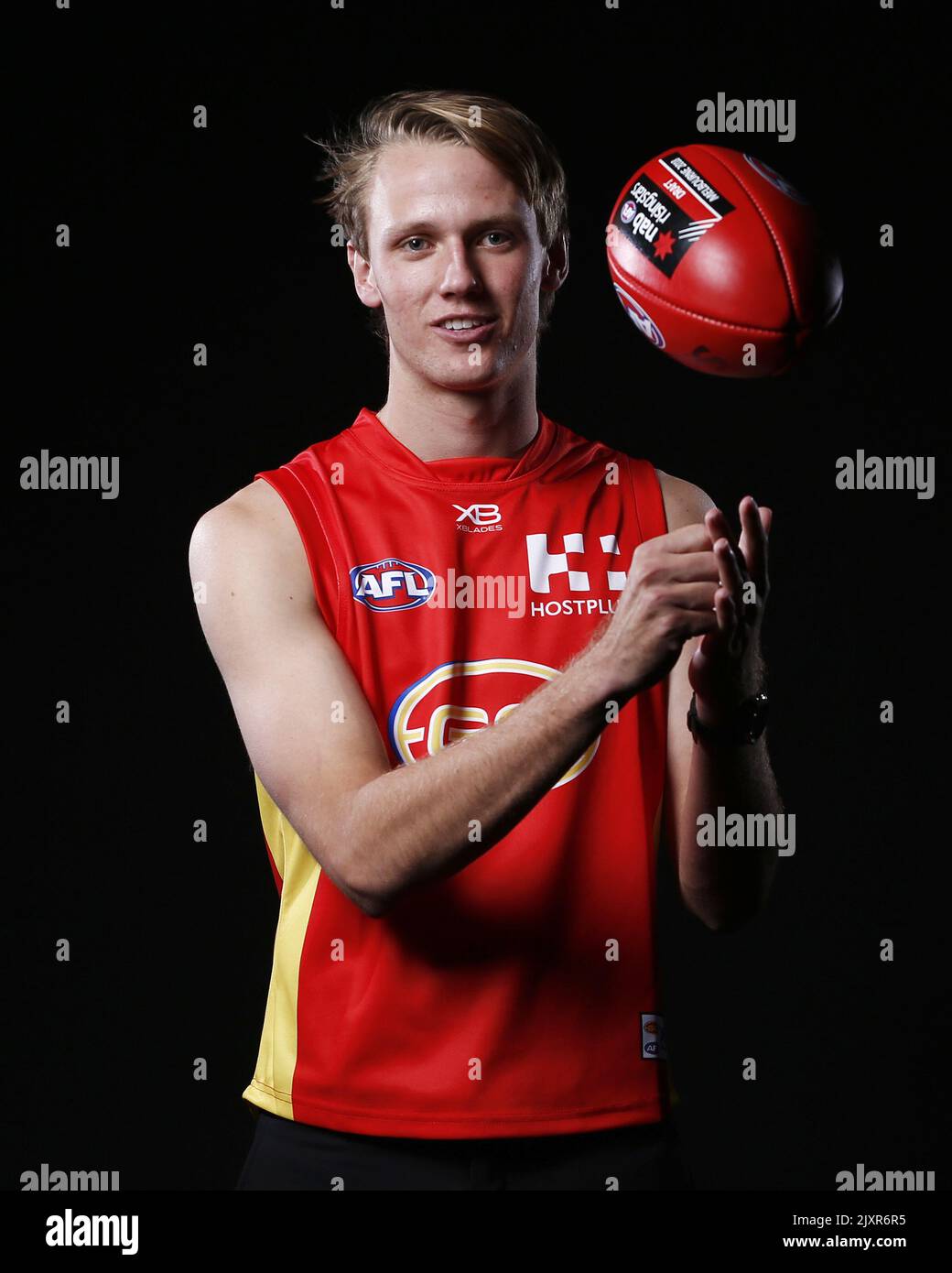Number 2 draft pick Jack Lukosius of the Suns poses for a photograph ...