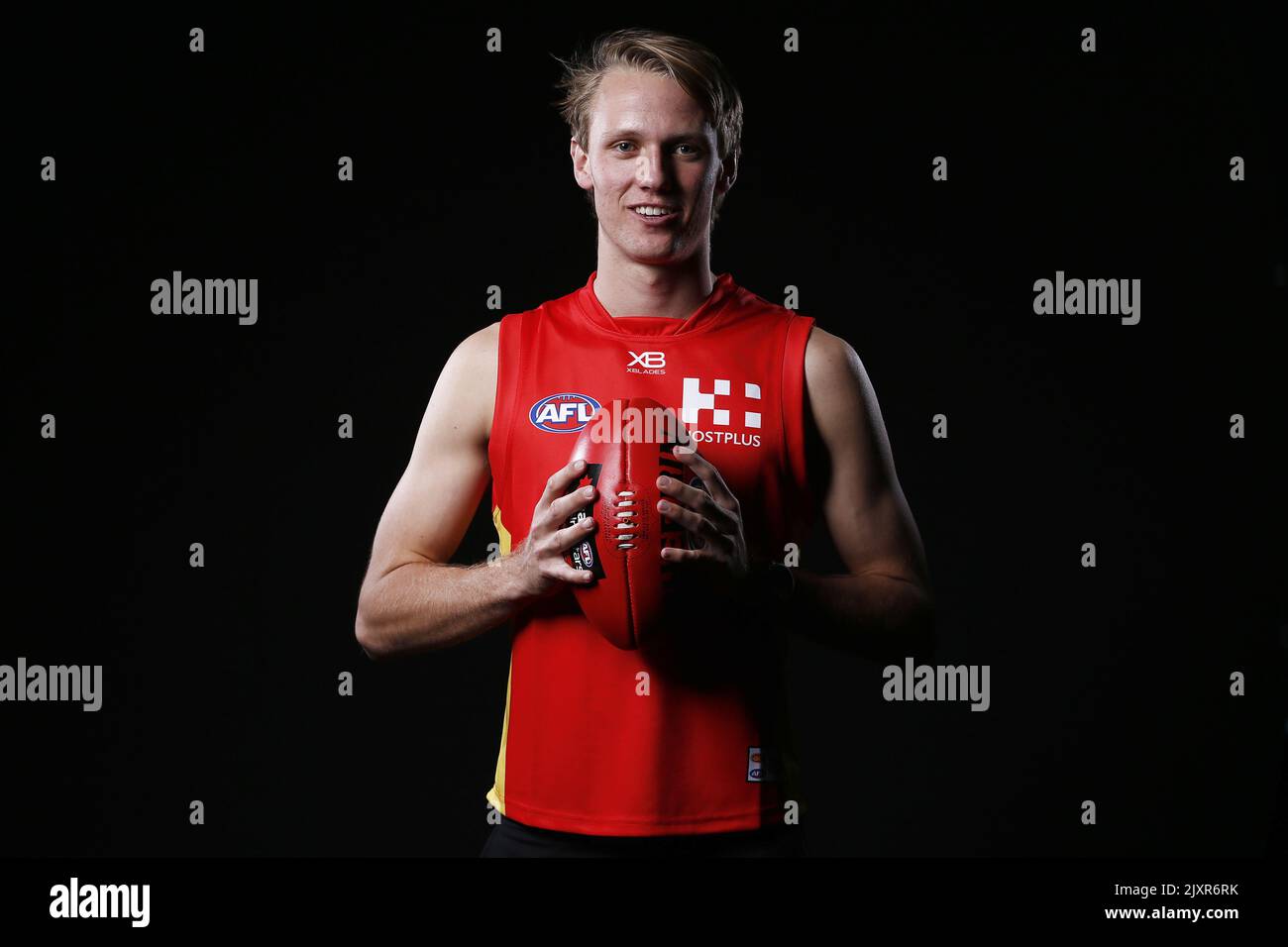 Number 2 draft pick Jack Lukosius of the Suns poses for a photograph ...