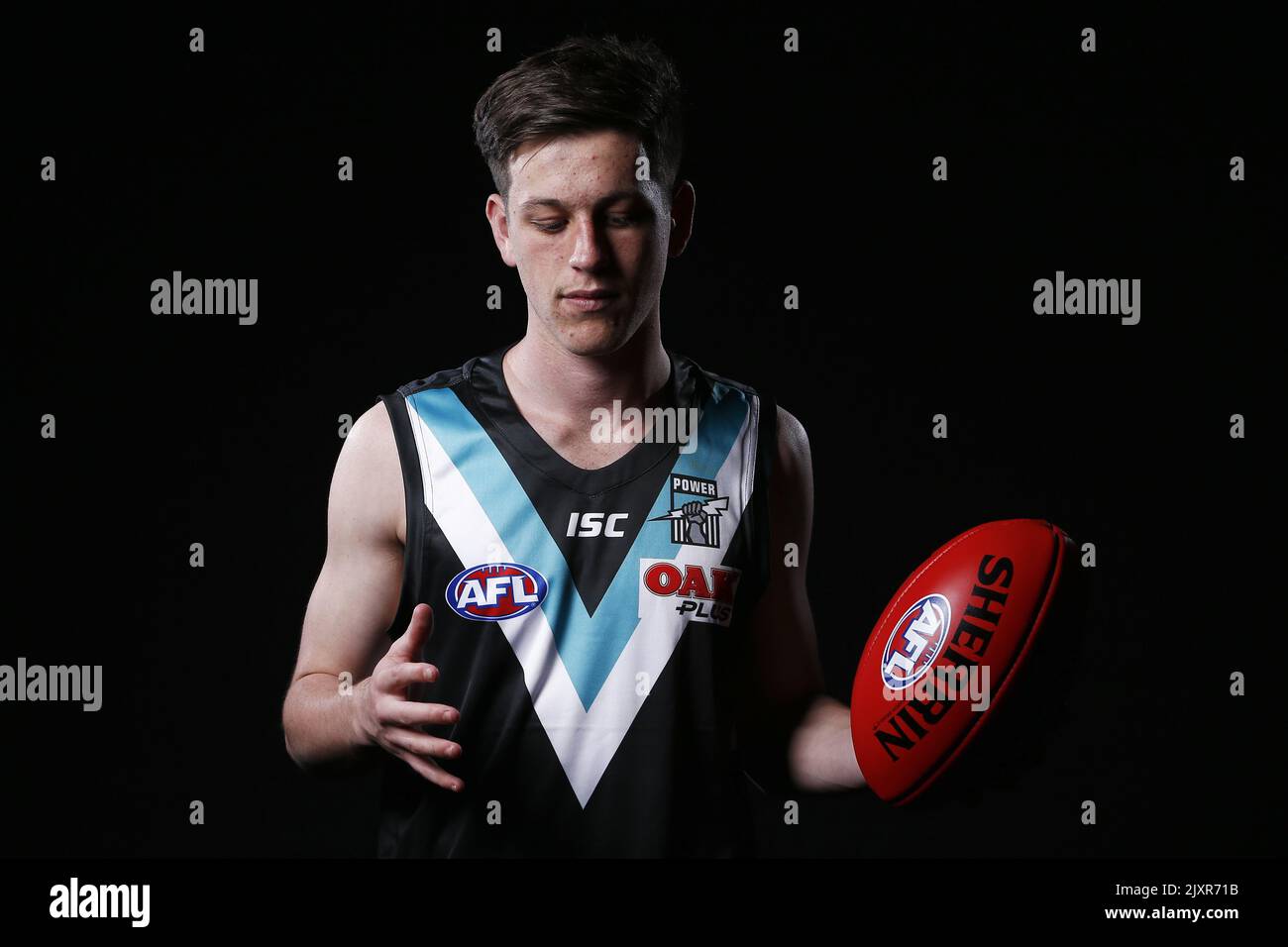 Number 12 draft pick Zak Butters of the Power poses for a photograph ...