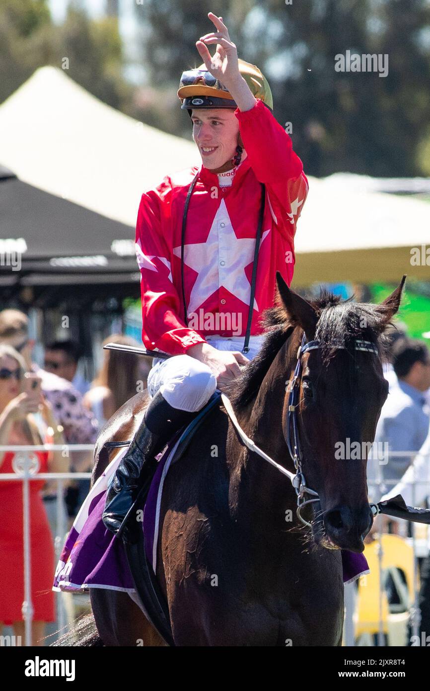 Jockey Ben Allen celebrates after riding Dance Music to victory in race ...
