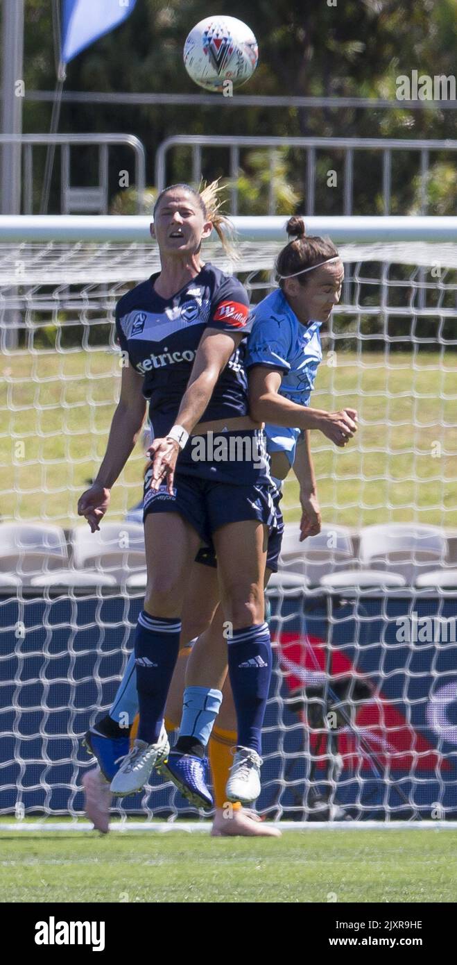 Caitlin Foord of Sydney and Laura Alleway of the Victory contest the ...